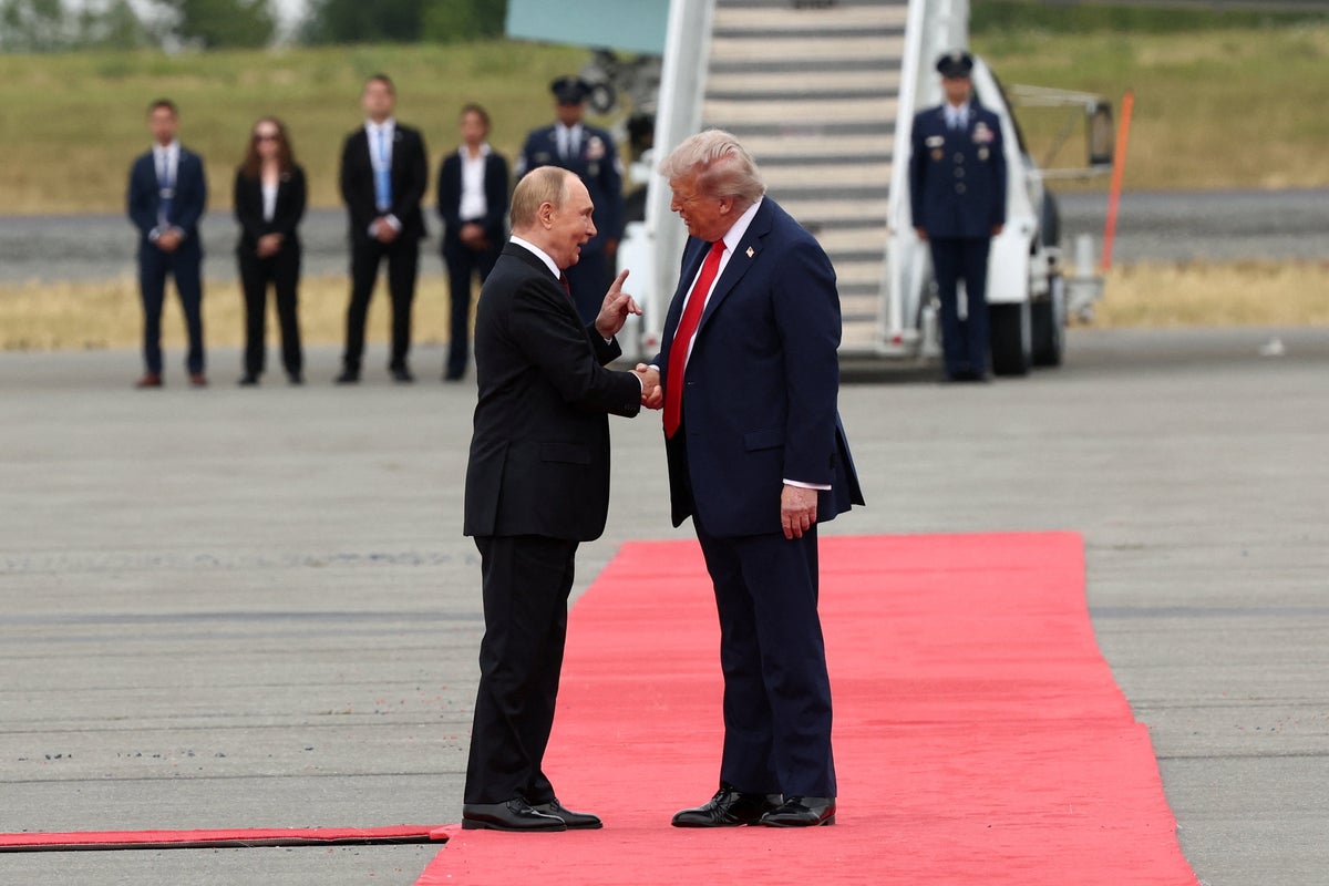 Trump and Putin shake hands as leaders arrive for historic Alaska summit