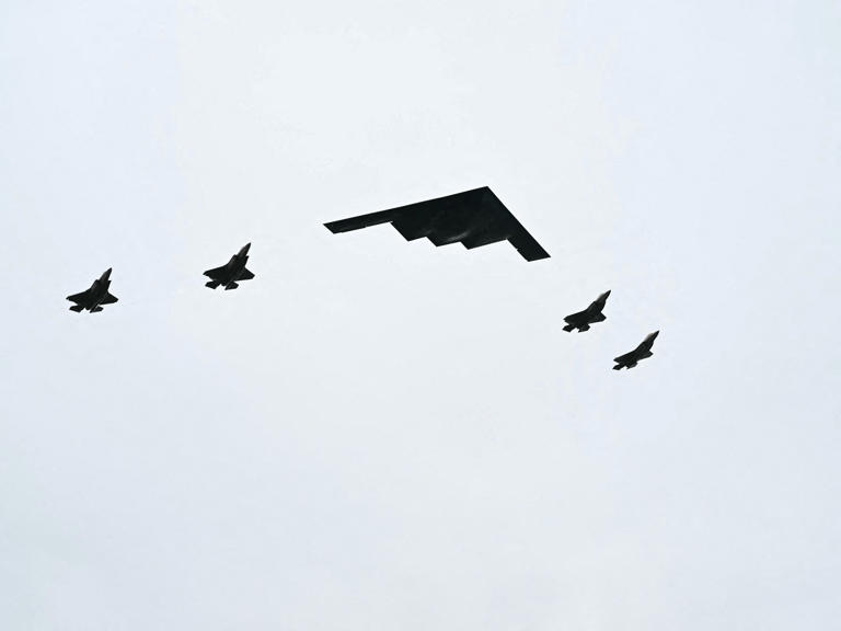 B-2 stealth bomber conducts flyover as Trump, Putin arrive at Alaska base