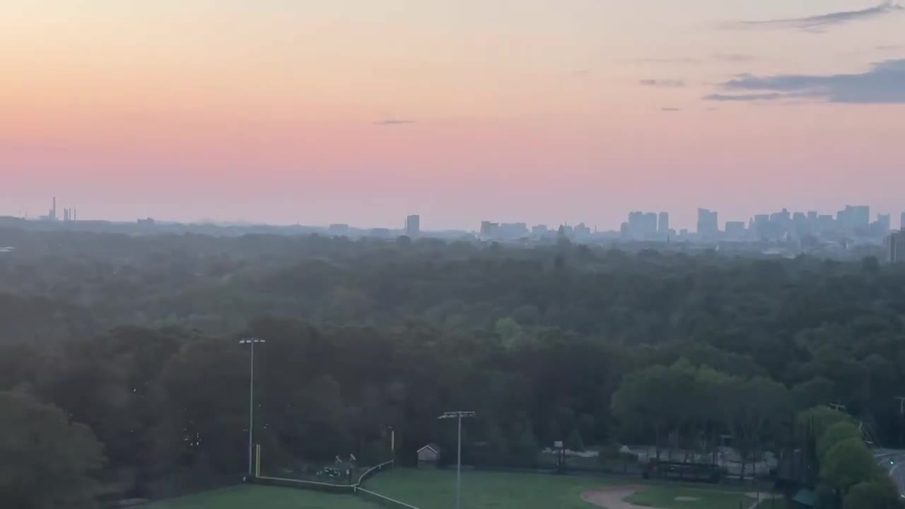 Fiery sunset with wildfire haze over Cambridge, Massachusetts