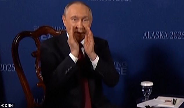 Putin shaking his head and shouting over journalists as they asked when ...