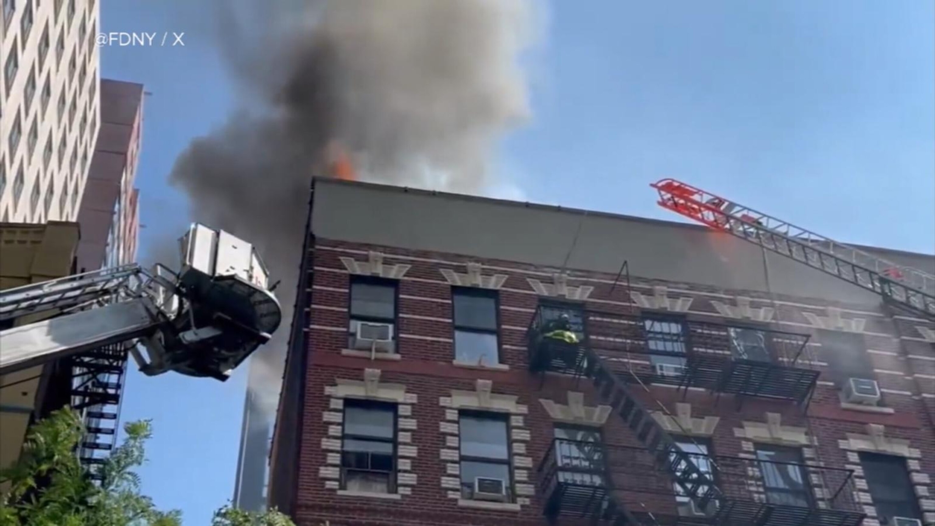 Firefighters hurt in large blaze on New York City's Upper East Side