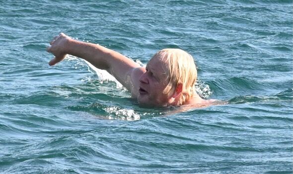 Boris Johnson in candid holiday snaps as he enjoys Greece break with ...