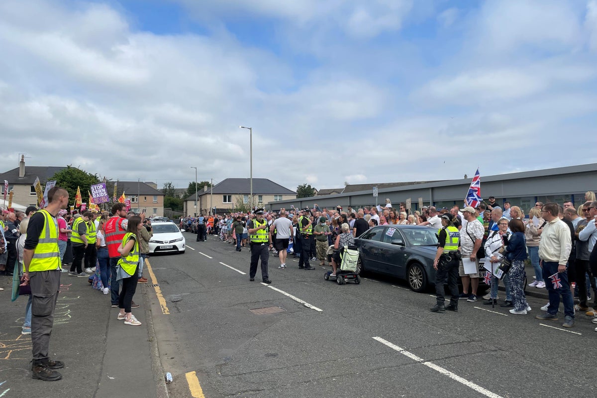 Anti-racism demonstrators square off against protesters shouting ‘send ...