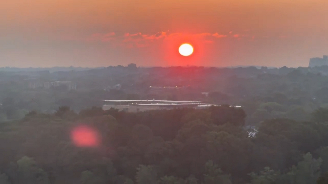 Fiery sunset with wildfire haze over Cambridge, Massachusetts