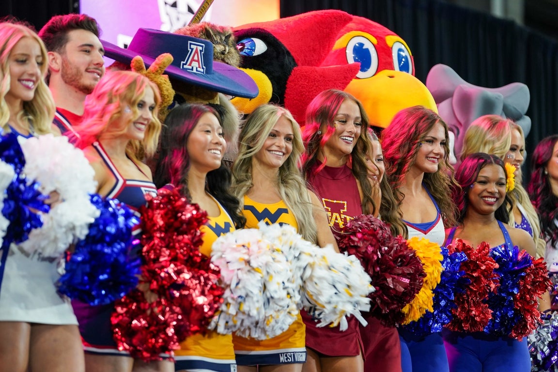 Unforgettable college football cheerleader moments, in photos