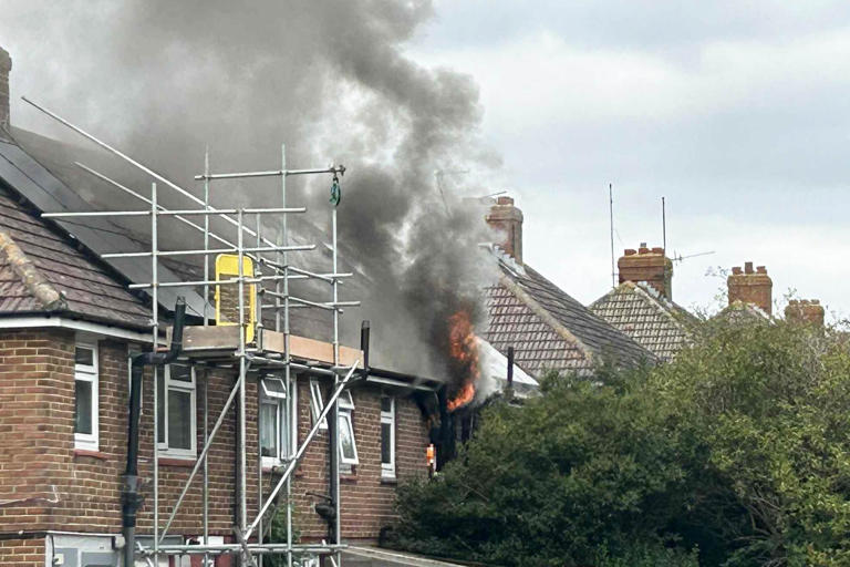 In photos: emergency services attend fire at Hove property as residents ...