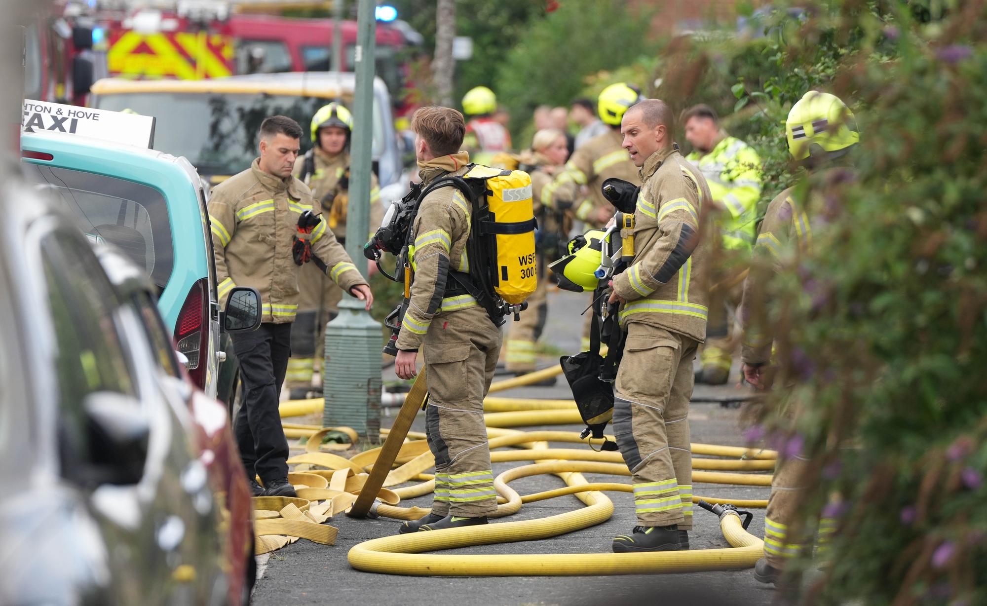 In photos: emergency services attend fire at Hove property as residents ...