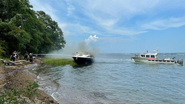 Crews battle boat fire near Mount Hope Bridge