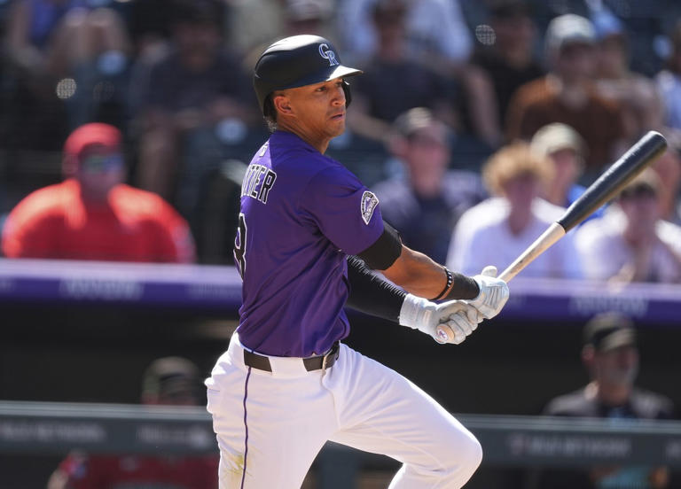 Major league-worst Rockies rally again to beat the Diamondbacks, 6-5