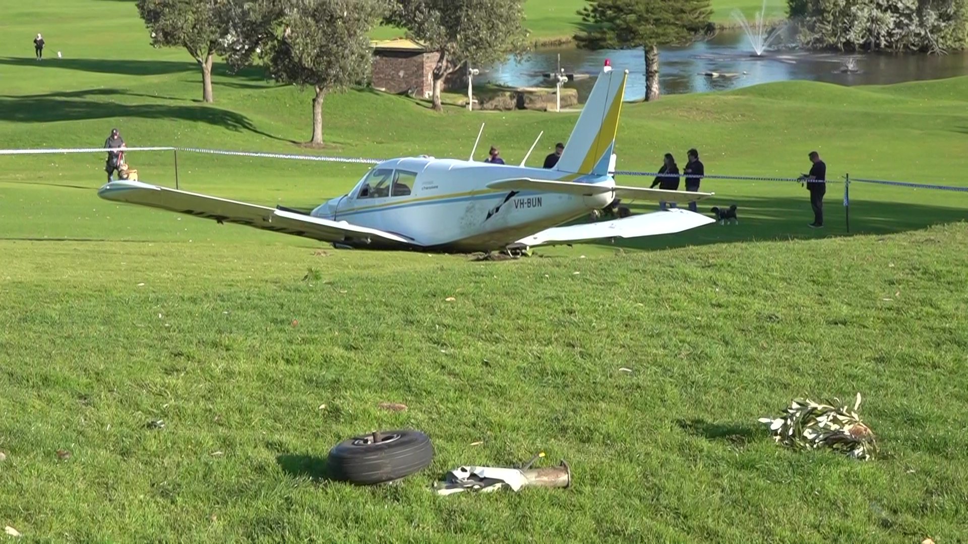 Moment light aircraft crashes into Sydney golf course