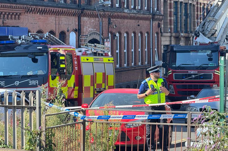 Mystery of body found in burning factory as police probe cause of fire