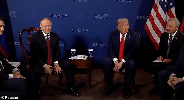 Moment flustered Putin winces as he's bombarded with questions from the ...