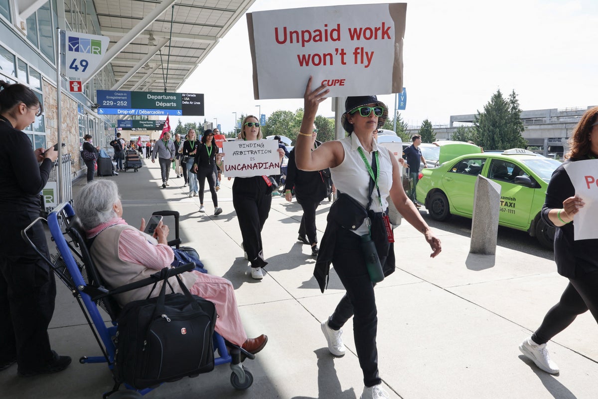 Air Canada grounded as striking cabin crews defy back-to-work order