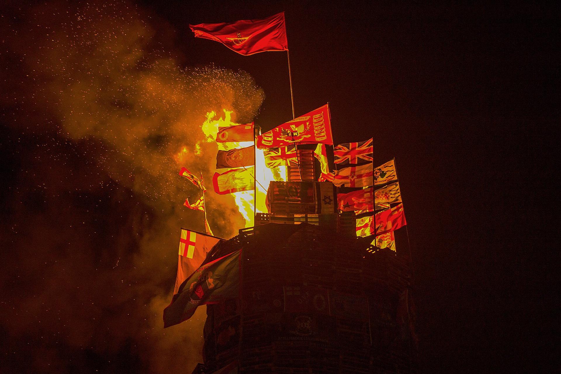 Crimson banner incinerated on Derry bonfire despite appeals from ...