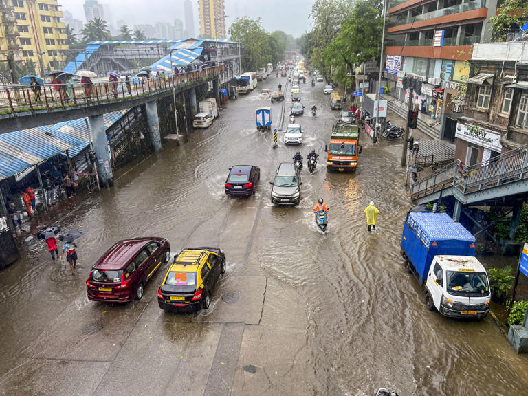 Heavy rains in Mumbai for 3rd day, low-lying areas inundated; IMD issues red alert