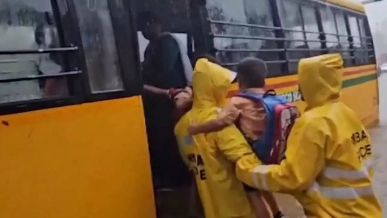 Watch: 6 children among 8 stuck in school bus on flooded Mumbai road ...