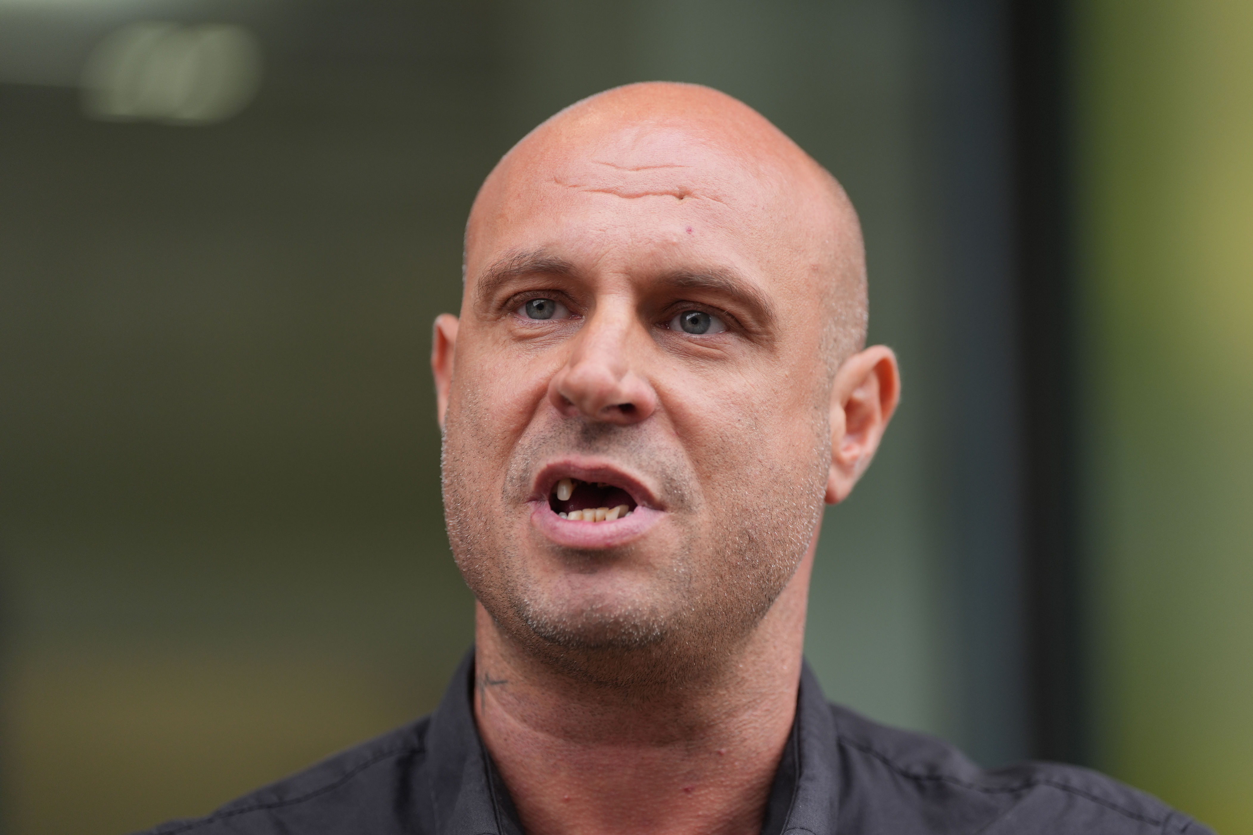 Men in court charged with violent disorder after protests outside ...