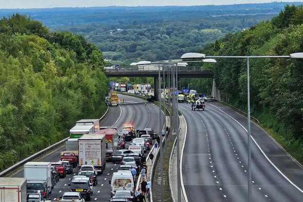 M20 crash horror pictured as tractor lands upside down after falling ...