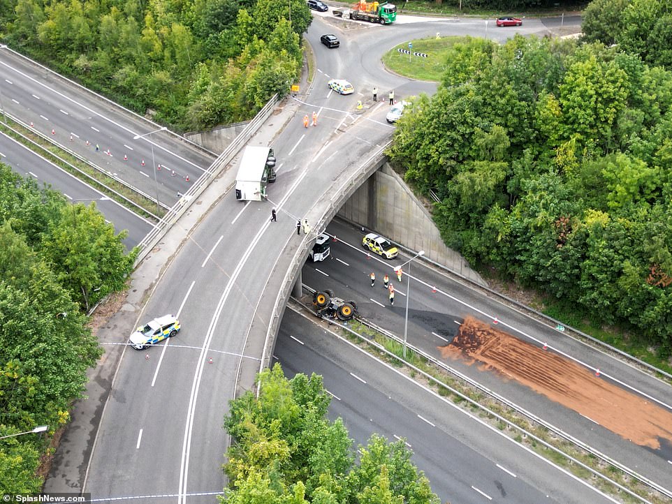 M20 motorway is closed after tractor fell from bridge