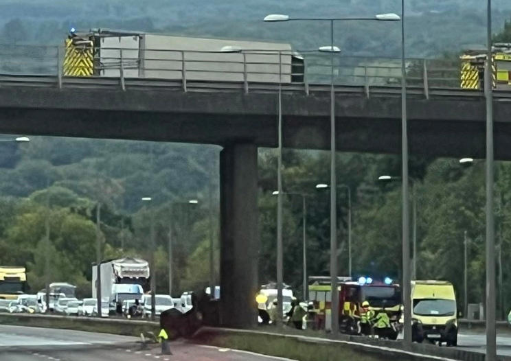 M20 shut as tractor plunges off bridge in Kent