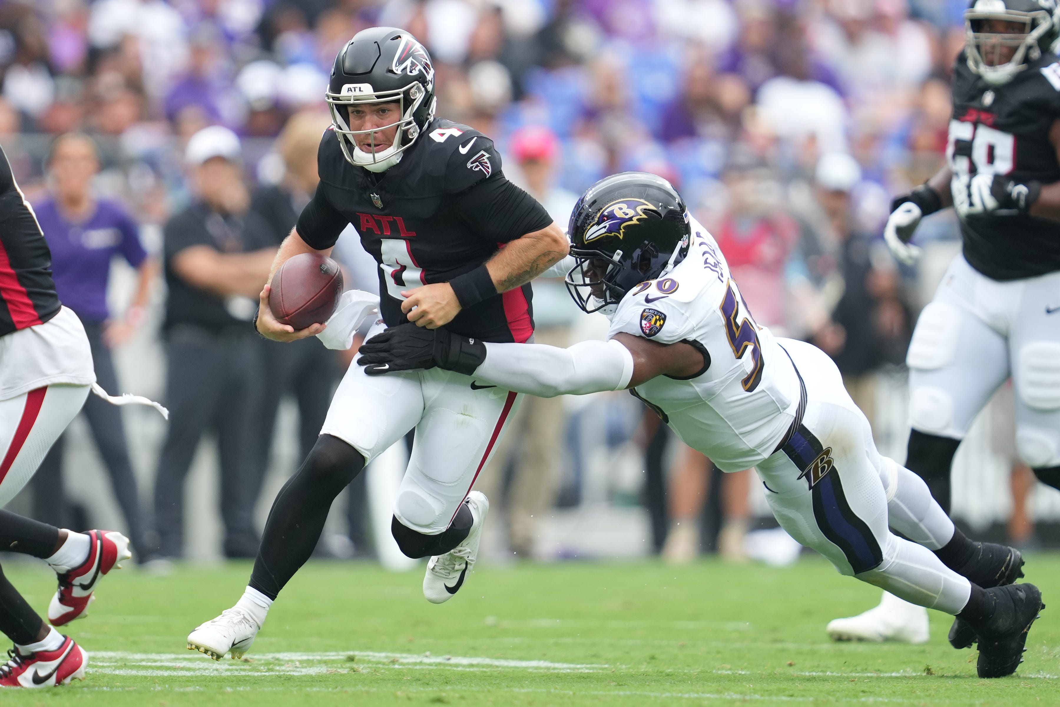 Ravens' 2nd-year pass rusher will be out until midseason after elbow ...