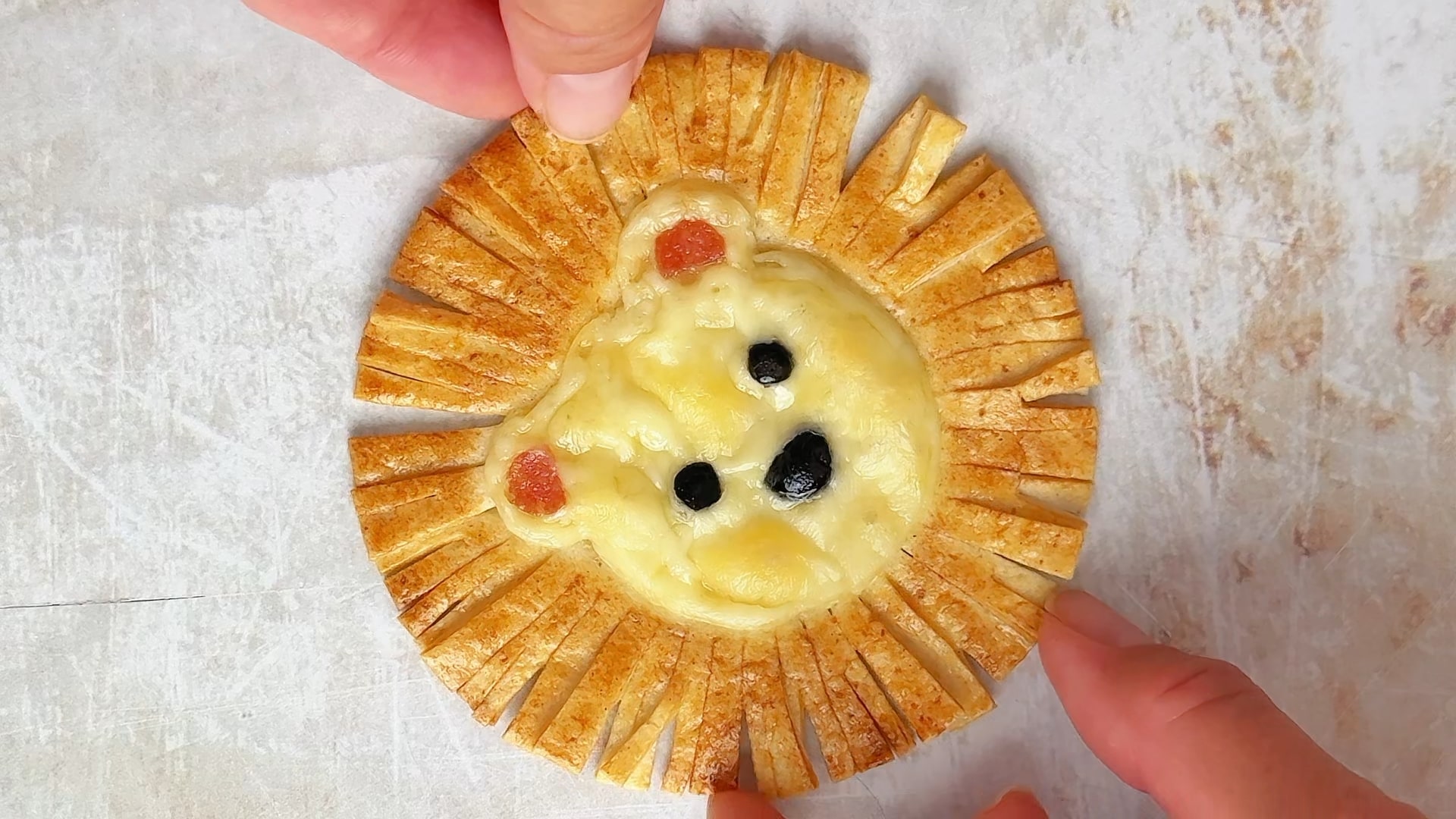 Mini-Löwen-Pizzen, Entzückender, mundgerechter Spaß