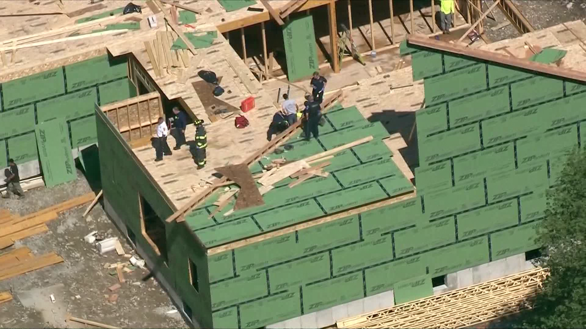 Worker rescued from 2nd floor of home after being pinned under wall