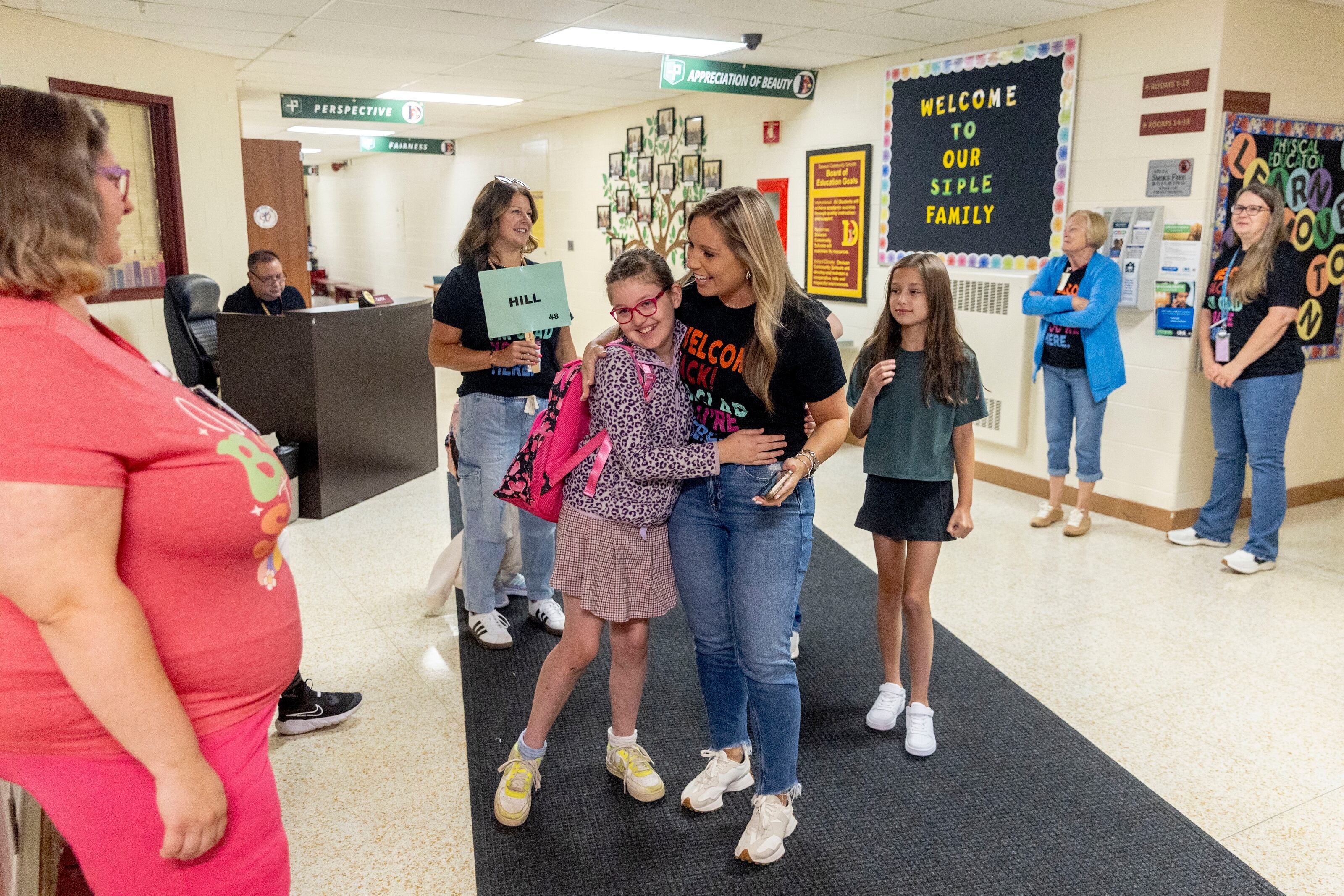 Smiles aplenty as Davison students return for first day of school