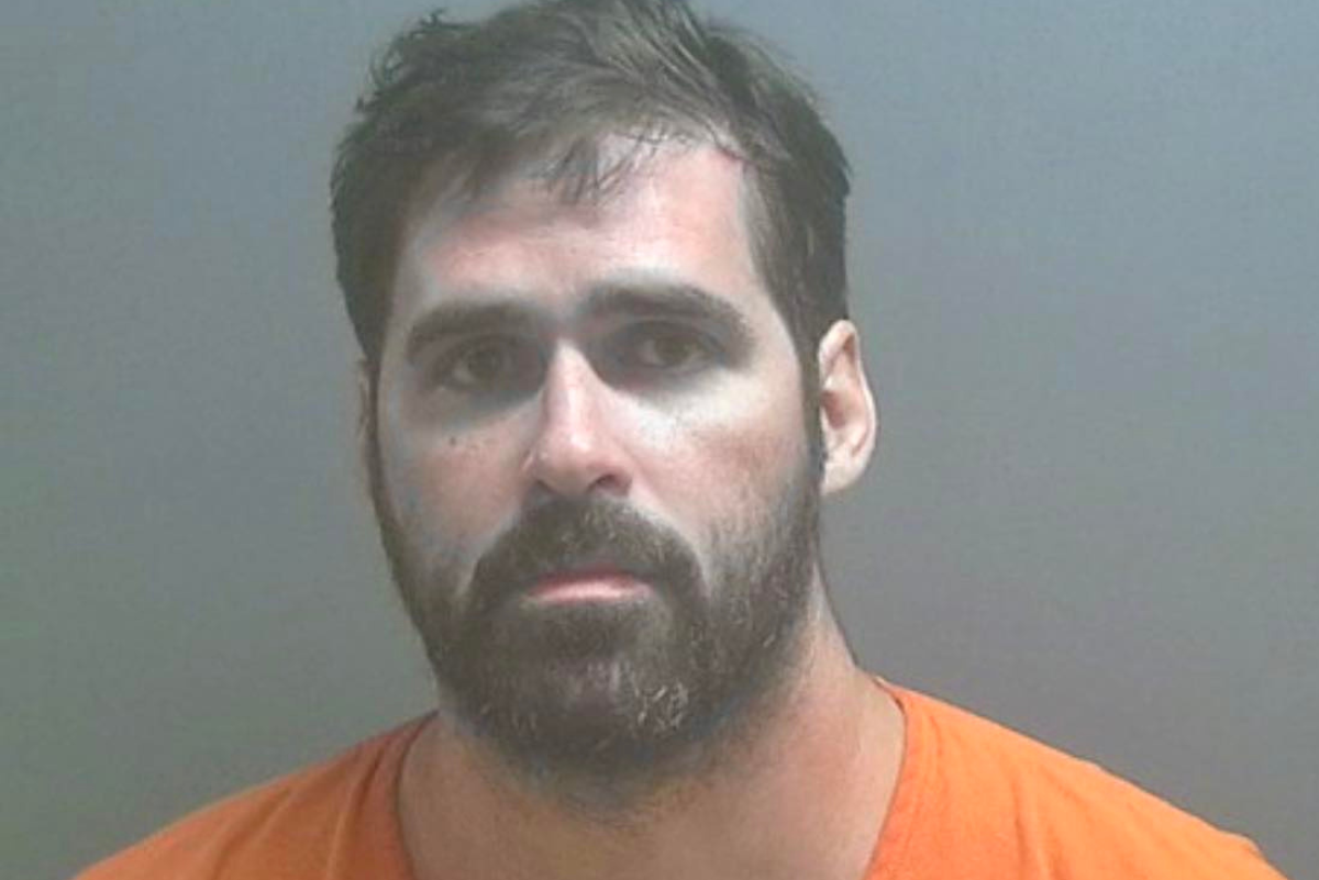 Murder suspect arrested in woods in his underwear after his ex’s new boyfriend was shot dead