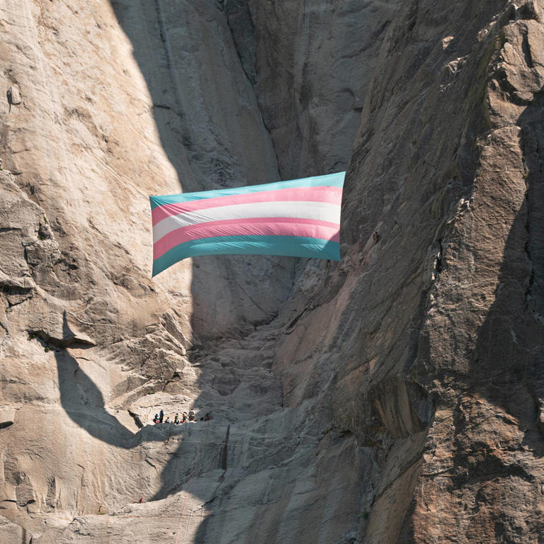 Park ranger fired after helping drape a transgender pride flag on ...