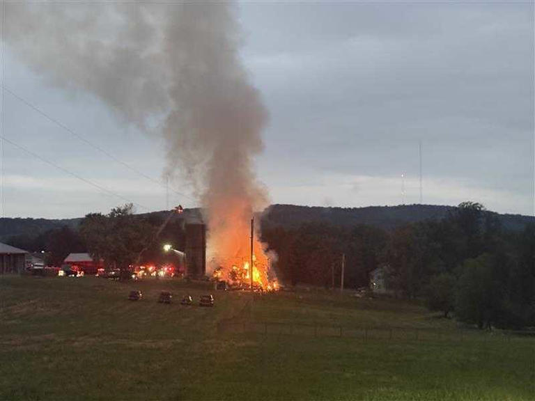 Smoke seen from miles away as flames engulf barn