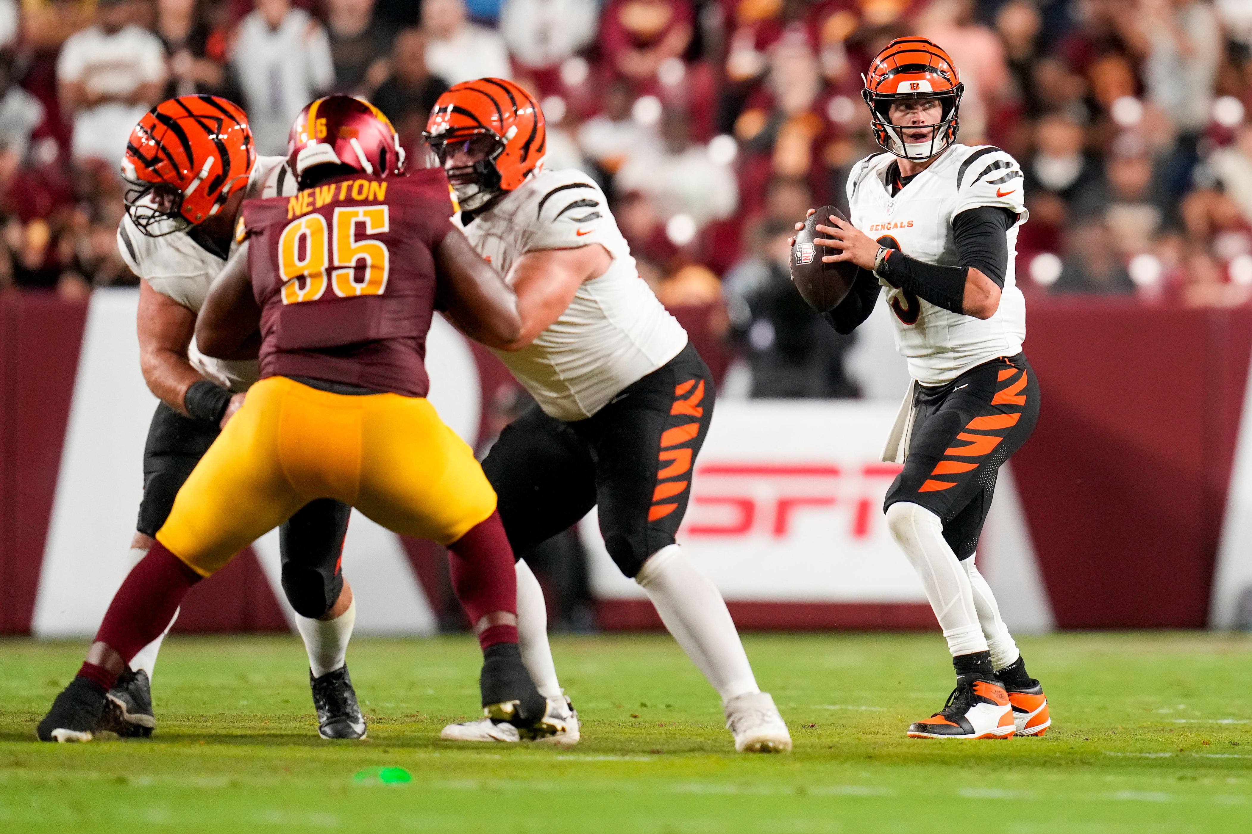 Bengals' first-team offense sees Joe Burrow get hit twice in preseason ...