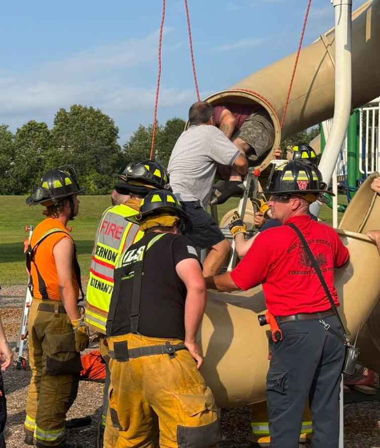 Firefighters forced to cut open child’s playground slide to release ...