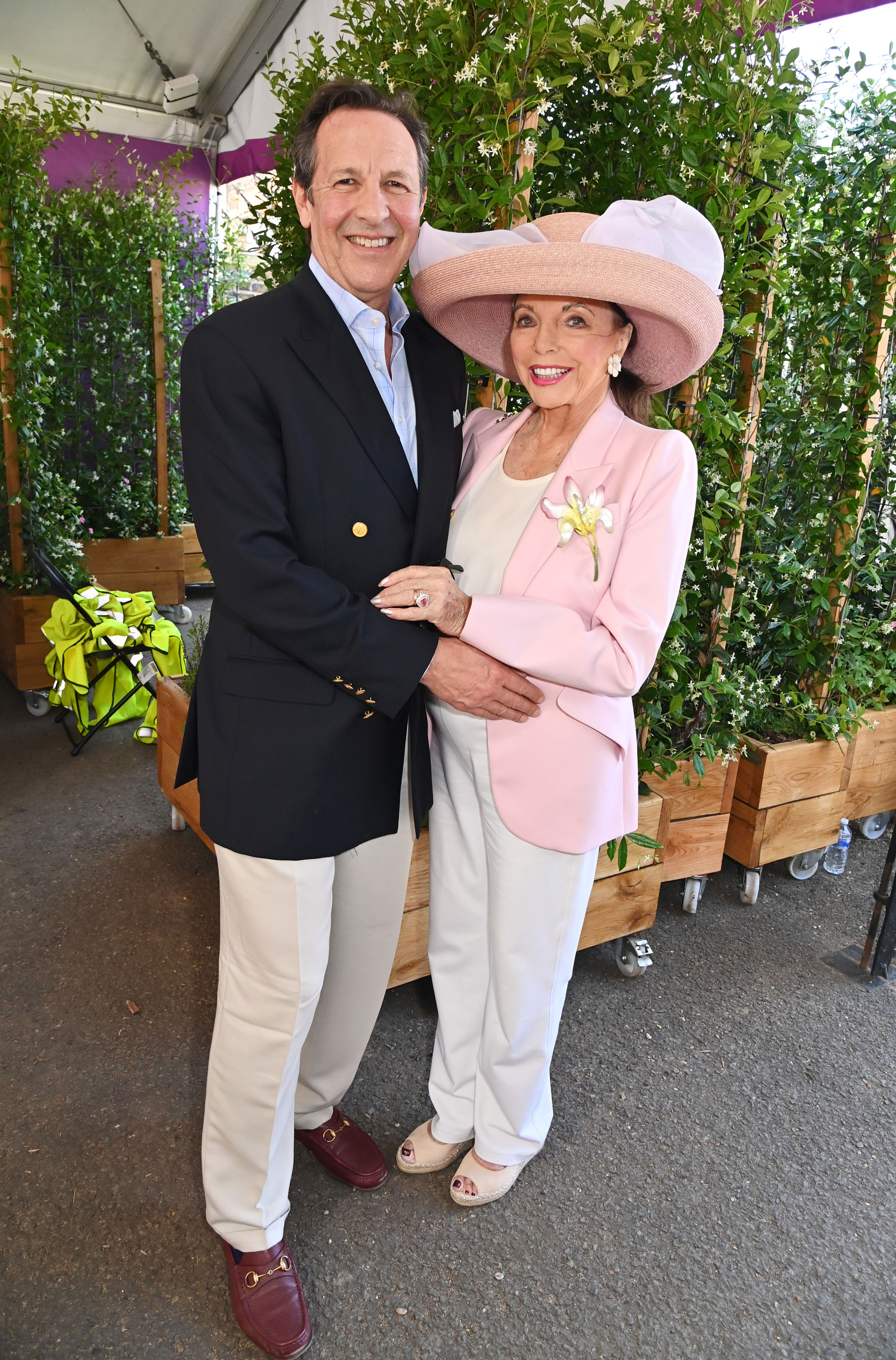 Joan Collins, 92, defies age in chic white swimsuit on vacation in the ...