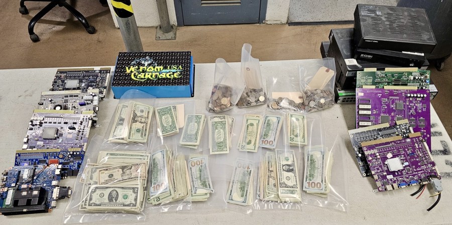 Cash, illegal slot machine components seized, but no arrests made in ...