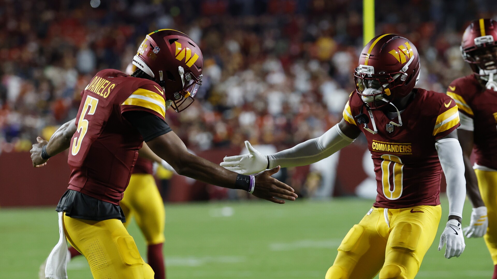 Jayden Daniels runs for a touchdown in his one series