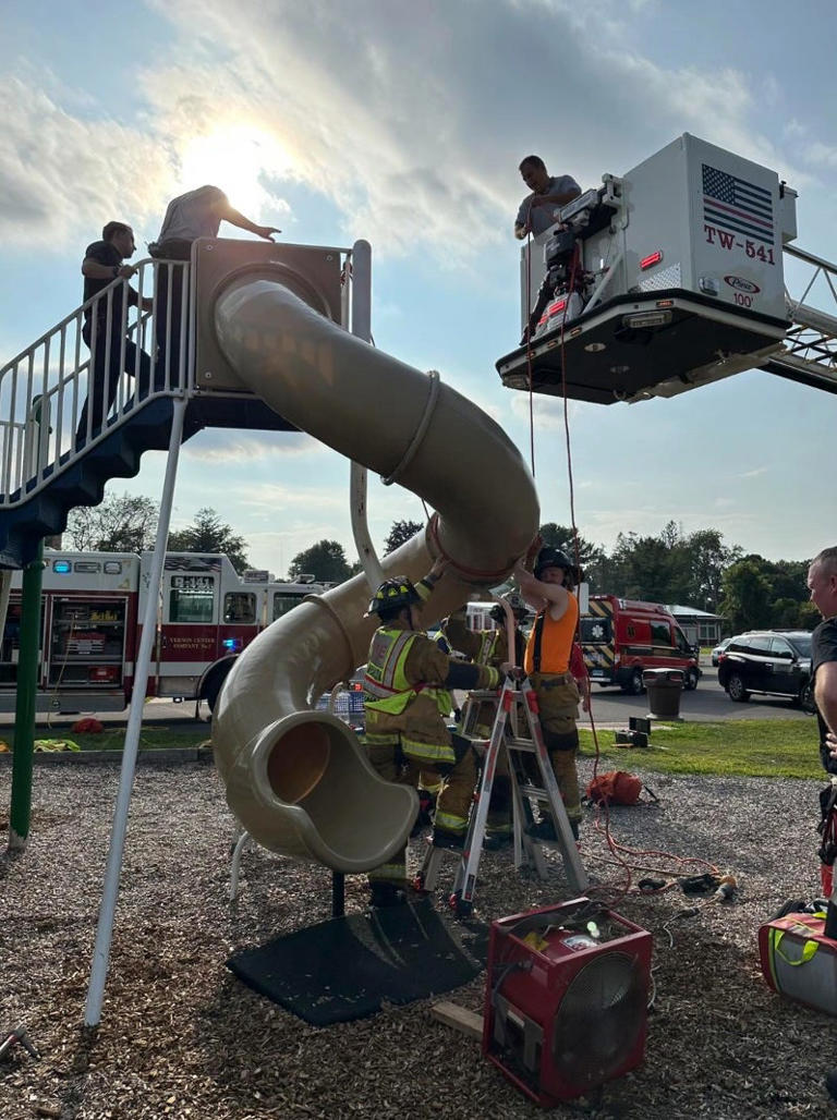 Firefighters forced to cut open child’s playground slide to release ...