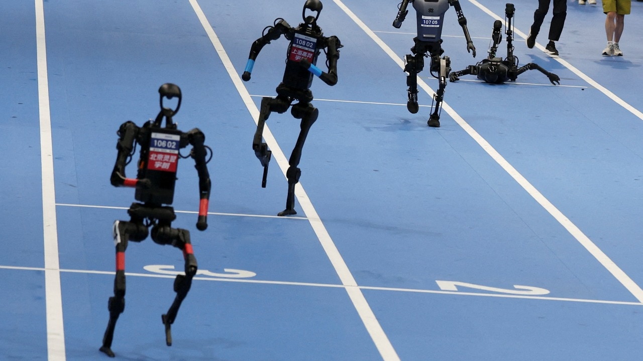 Robots stumble, crash and backflip at China's wild humanoid Olympics ...