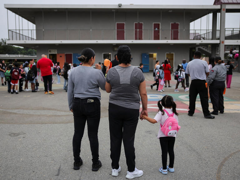 Immigrant families fear Trump's deportations as children return to school