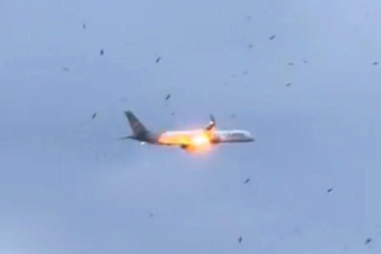 Boeing plane makes emergency landing after engine bursts into flames ...