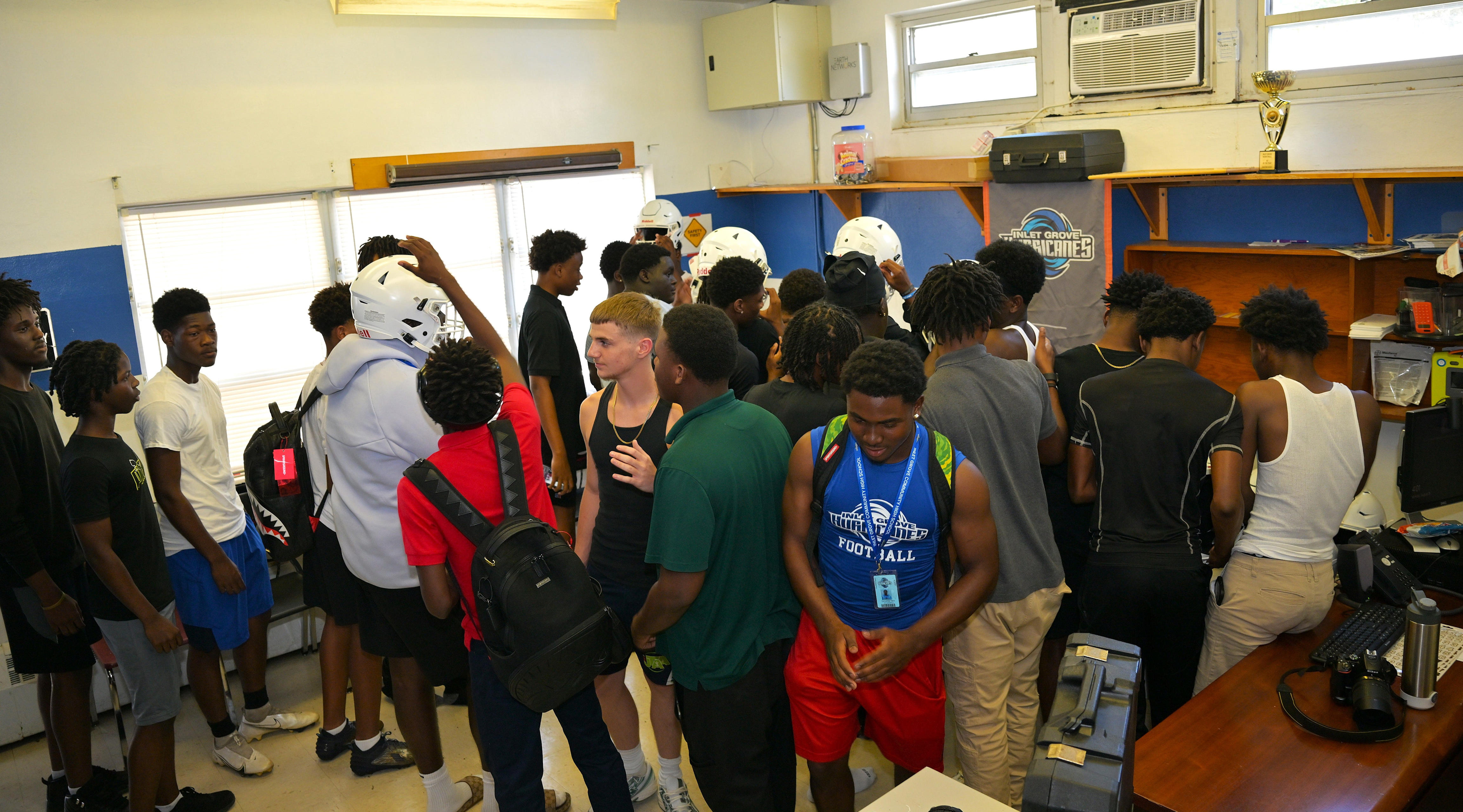 Dream come true: Inlet Grove football coaches surprise team with new ...