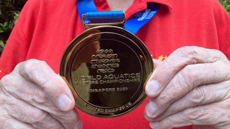Man, 84, achieves swim medal dream after 70 years