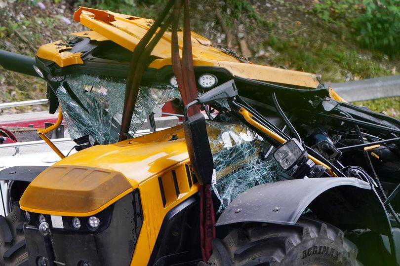 Man in critical condition in hospital after tractor fell off bridge ...