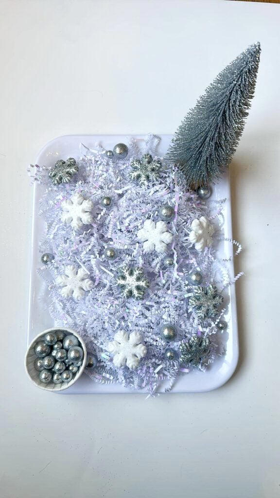 Fun Snowflake Sensory Bin For Toddlers