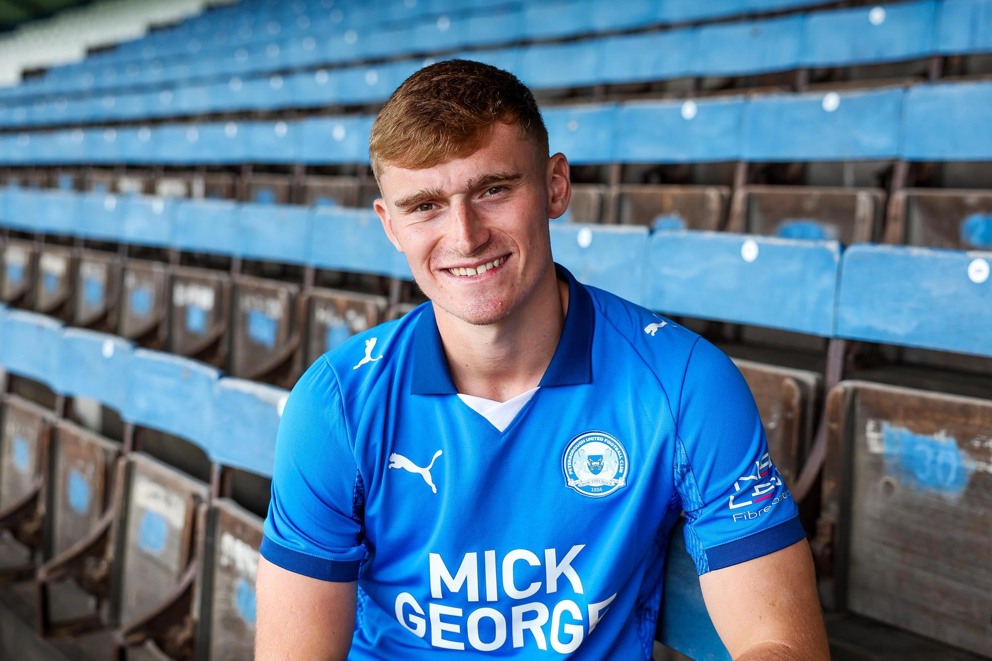 Peterborough United complete the signing of Accrington Stanley midfielder