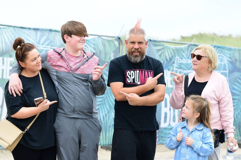 Families travel miles to line up in '100 person' queue at beach for ...