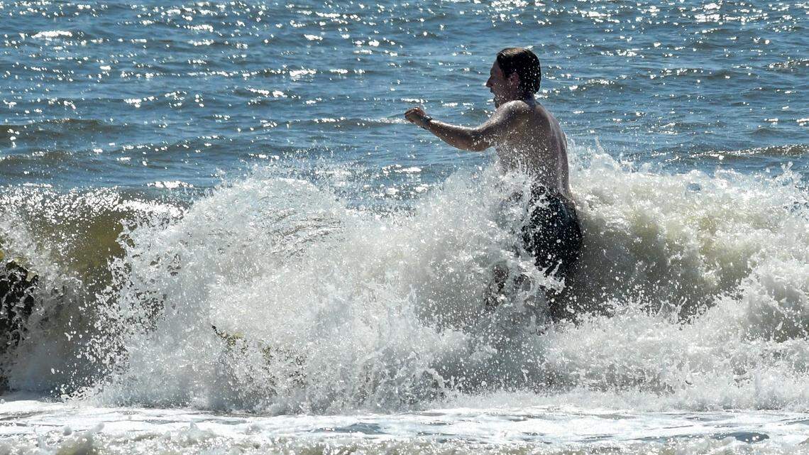 As Hurricane Erin keeps beachgoers on the sand, Hilton Head's surfers ...