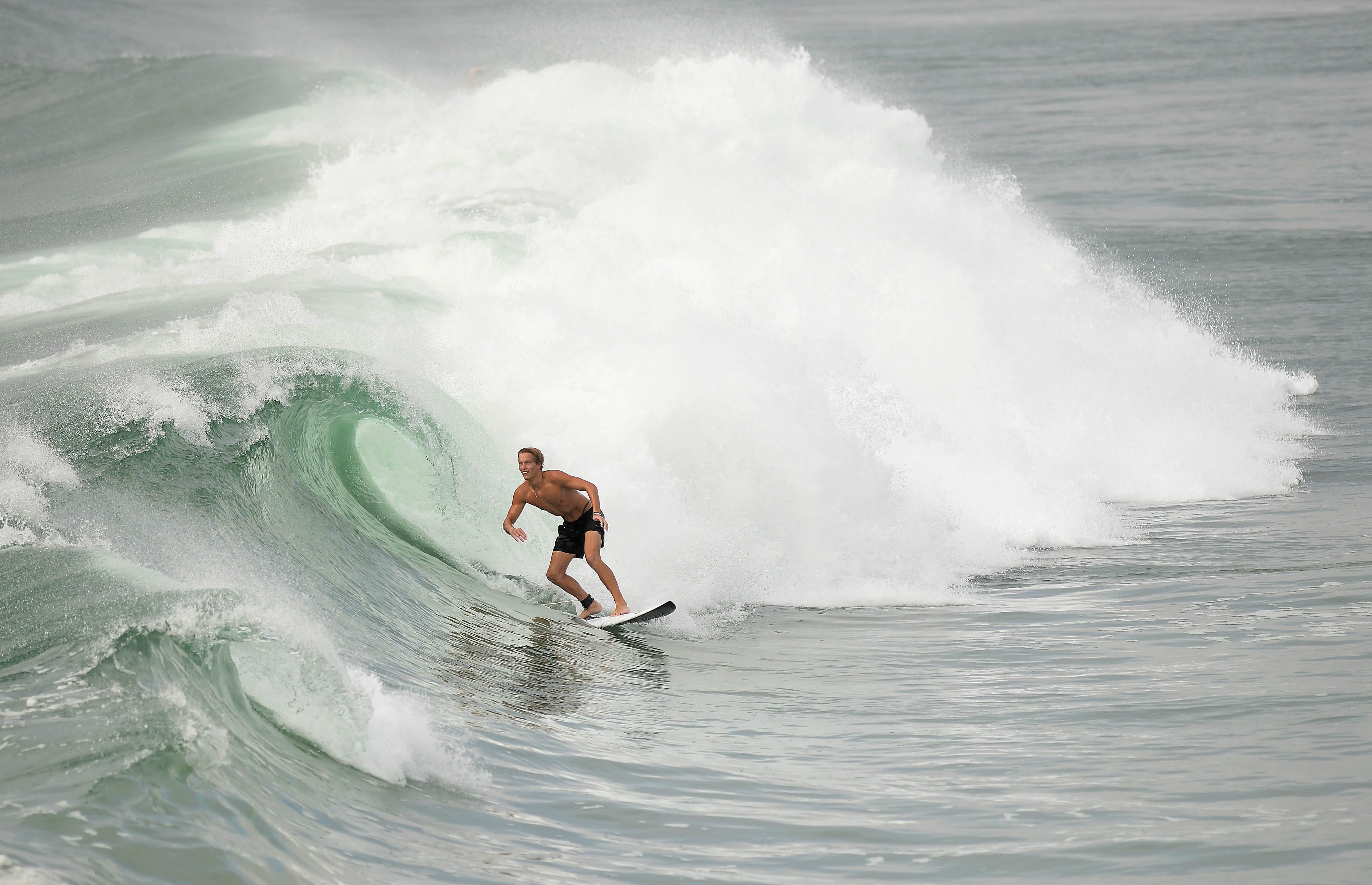 As Hurricane Erin approaches NC coast, surfers catch some waves at ...