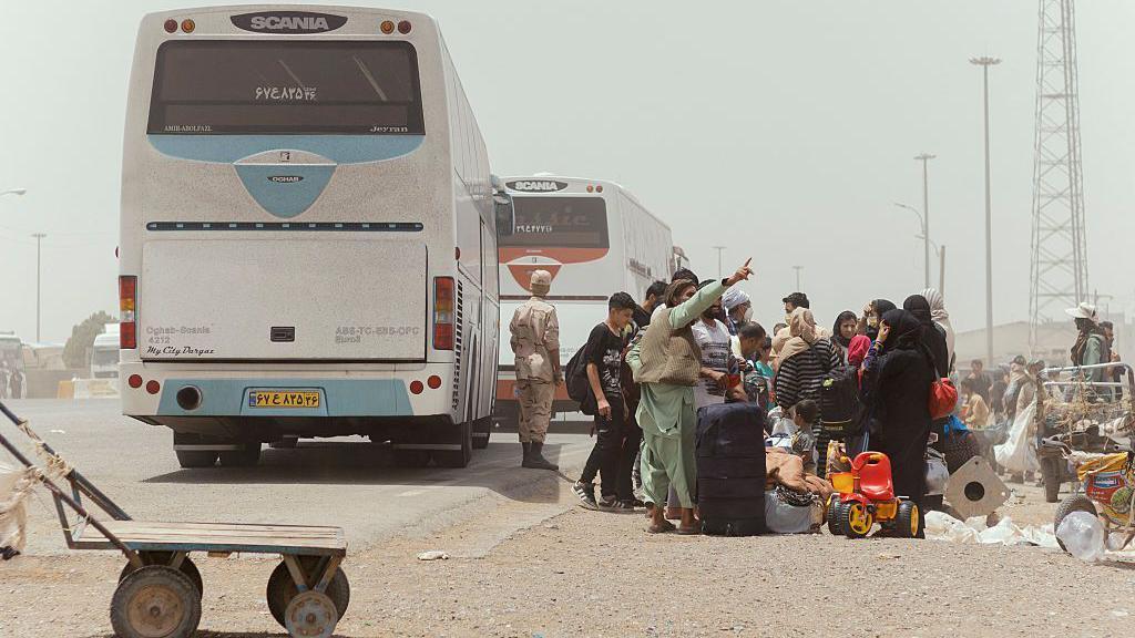Dozens of Afghan deportees from Iran killed in bus crash