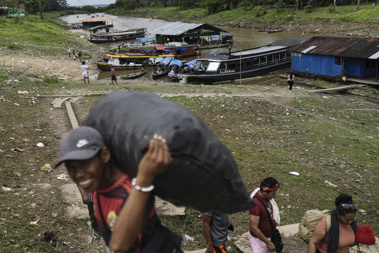 Residents of a remote island disputed by Colombia hope their Peruvian ...
